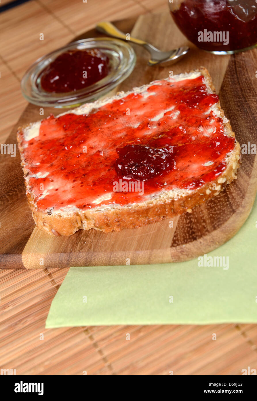 Breakfast with strawberry jam Stock Photo - Alamy