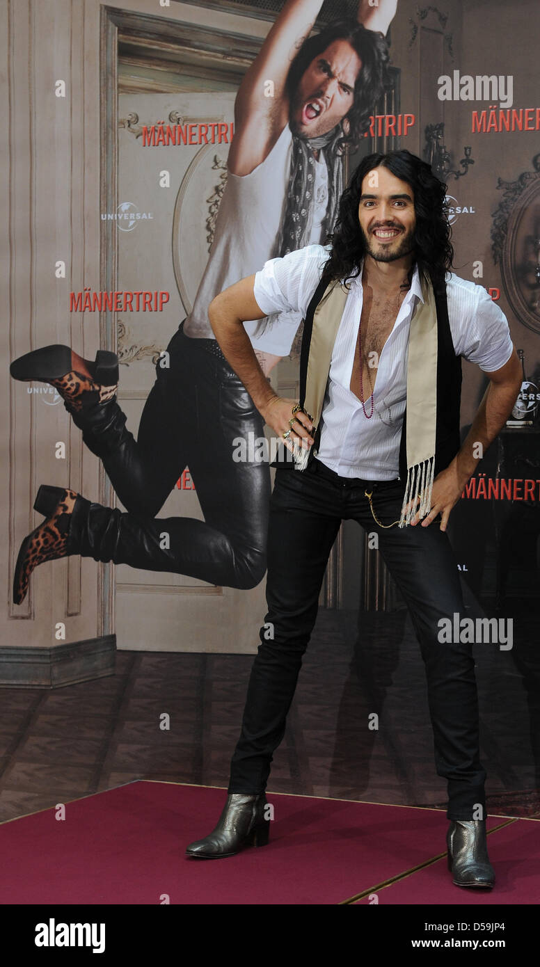 American actor Russell Brand poses at the movie screening of 'Get him ...