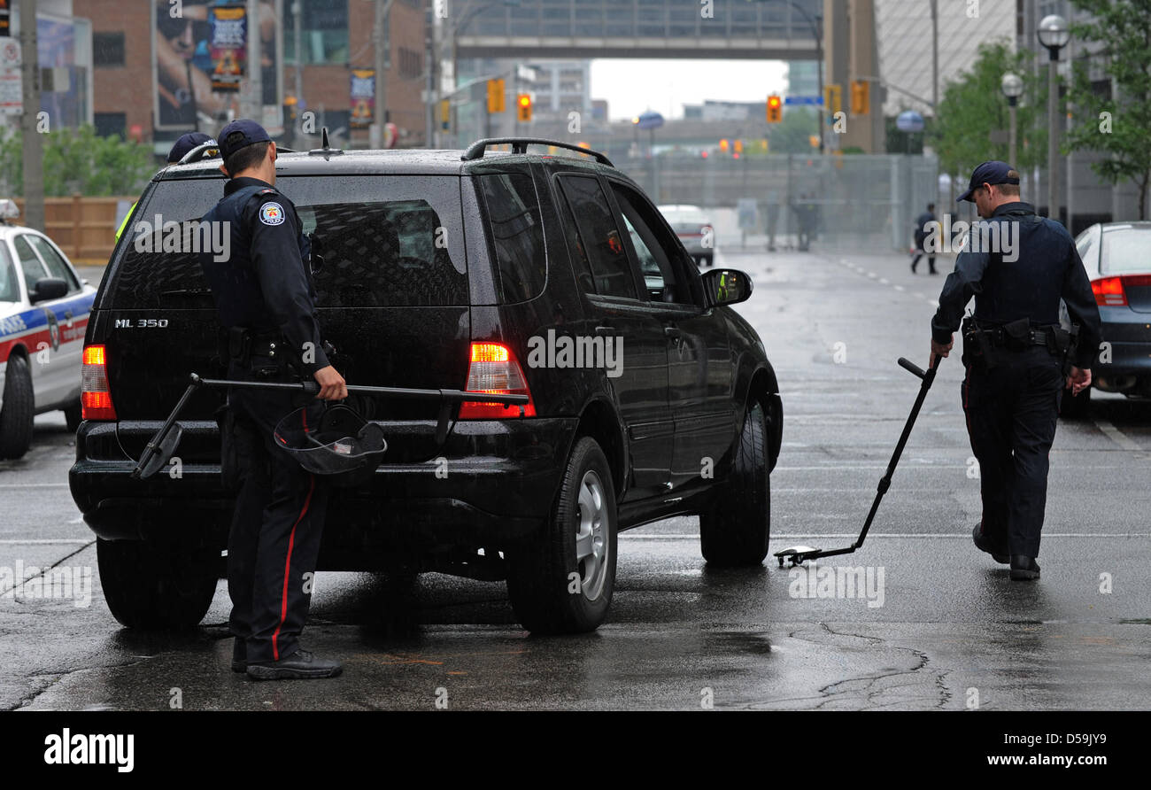 The police during the security check of a car in Toronto, Canada on 26 ...