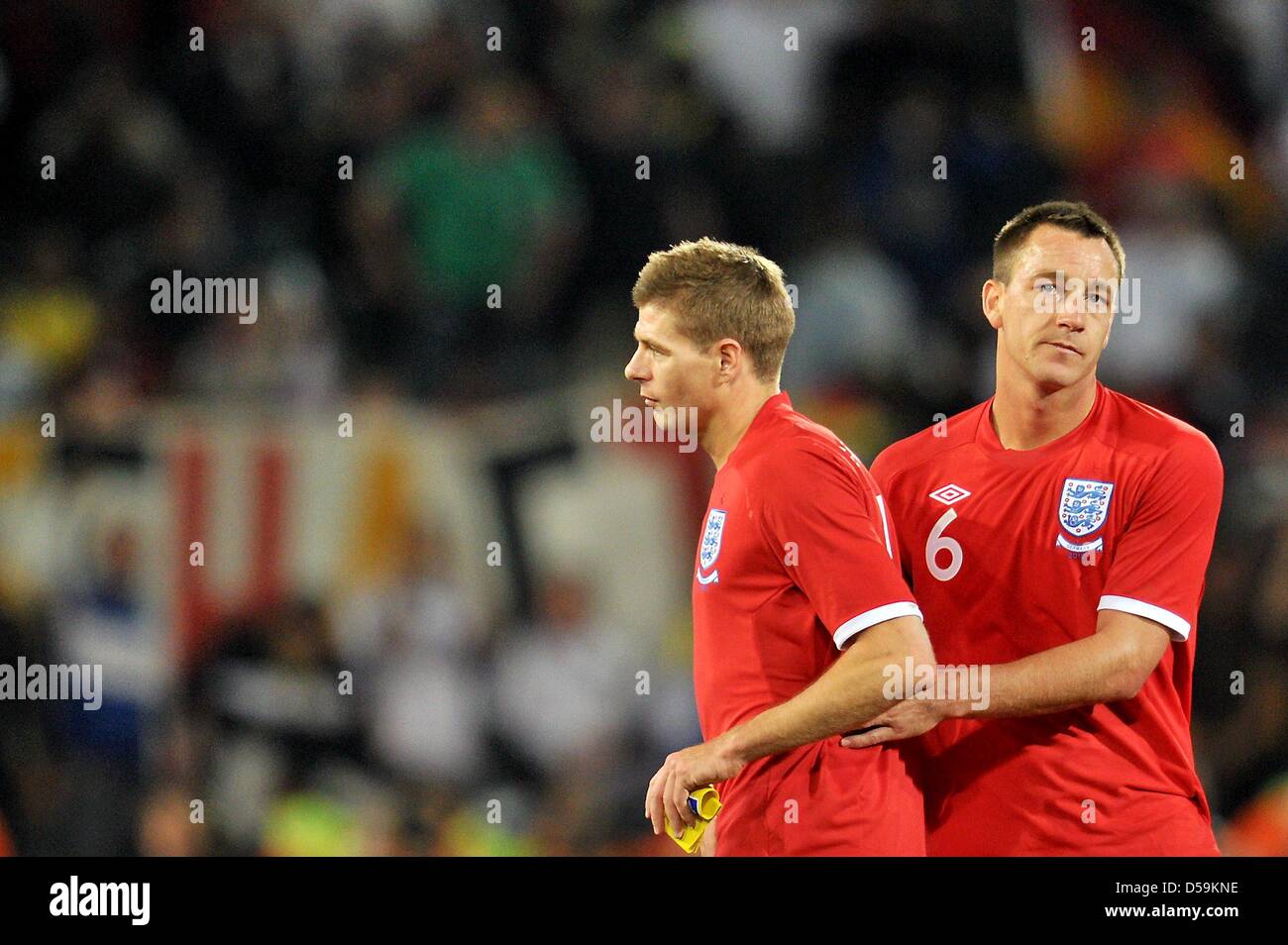 Steven Gerrard and John Terry (R) of England react after the final ...