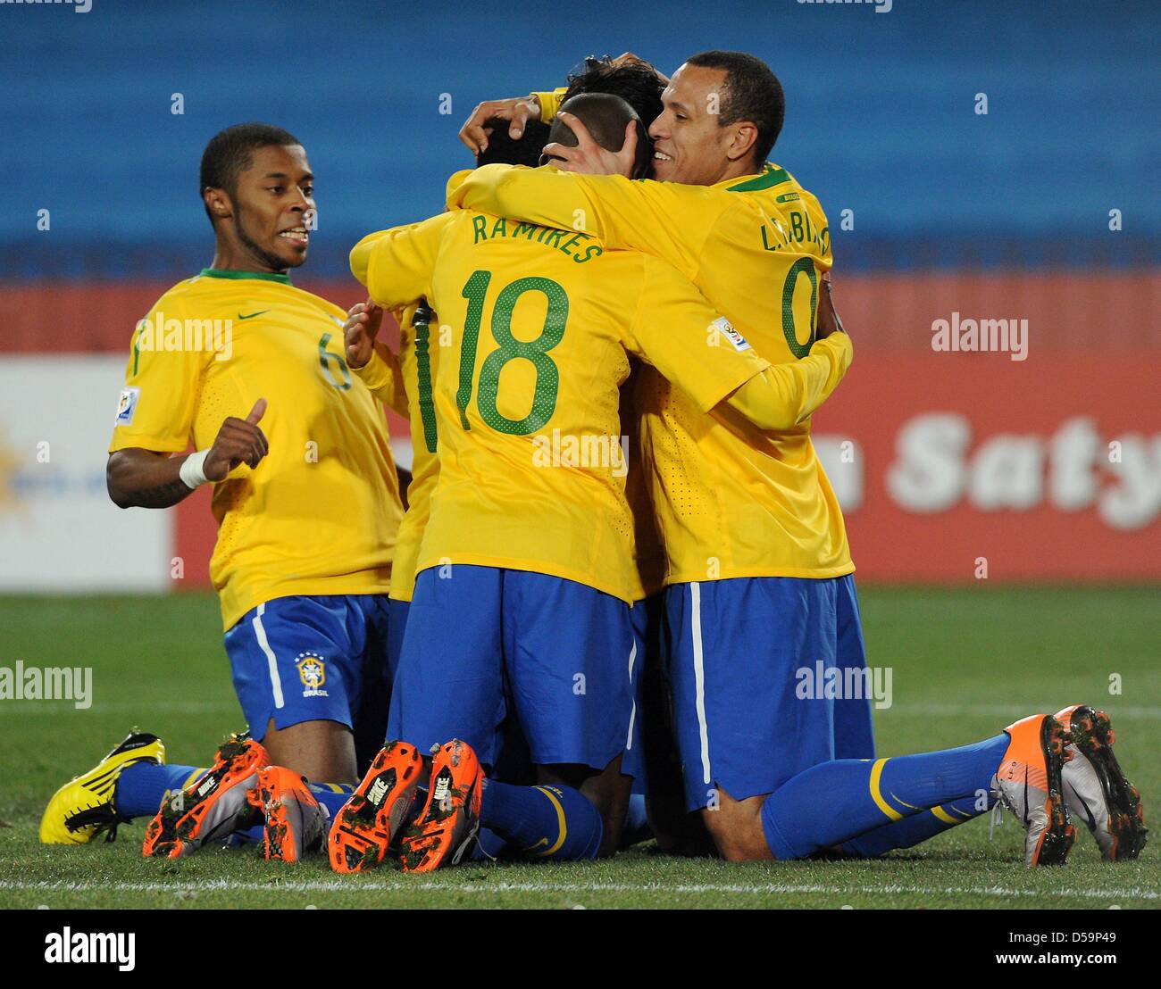Brazil's Michel Bastos (L-R), Ramirez and Luis Fabiano celebrate the 3 ...