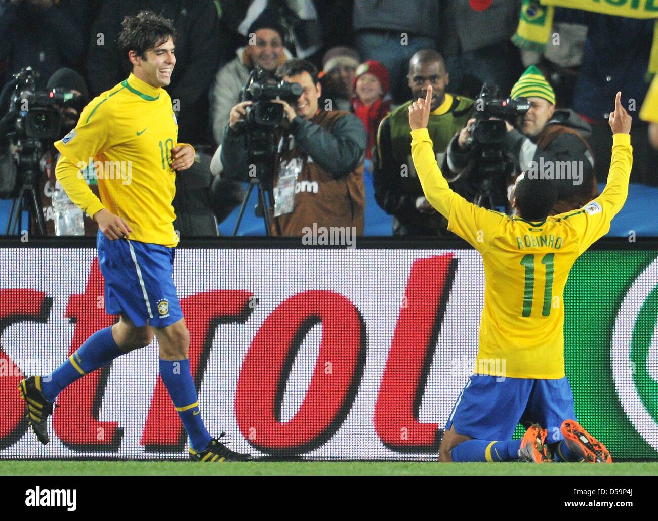 Robinho (R) of Brazil celebrates with Kaka after scoring the 3-0 during ...