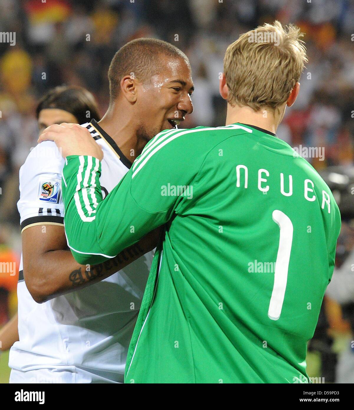 German goalkeeper Manuel Neuer (R) celebrates with team mate Jerome ...