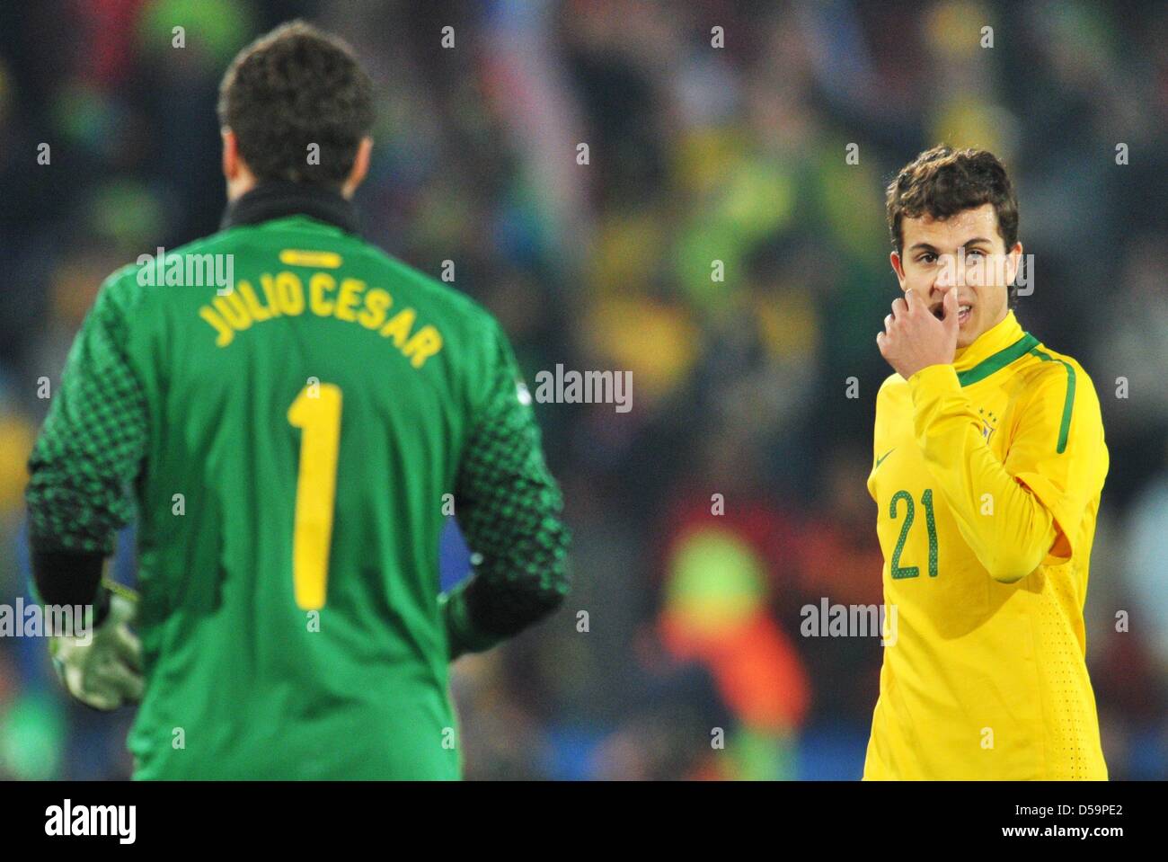 Julio Cedar and Nilmar (R) of Brazil celebrate after the final whistle ...