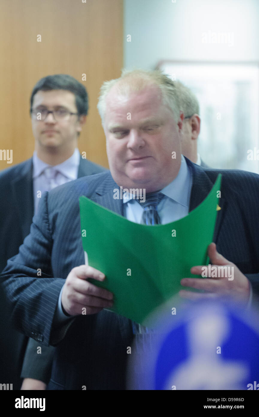 Mayor Rob Ford emerges from his office to attend City Council. In the ...