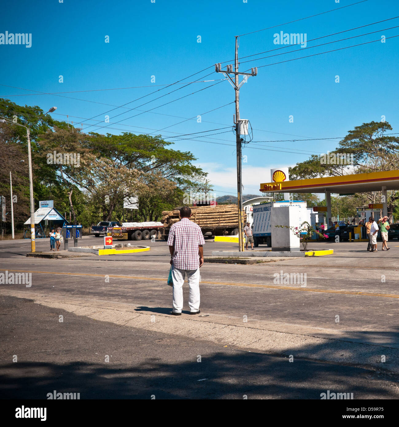Man stand alone on the border road, Nicoya, Costa Rica Stock Photo - Alamy