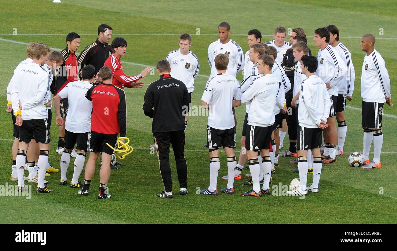 German headcoach Joachim Loew briefs the team during a training session ...