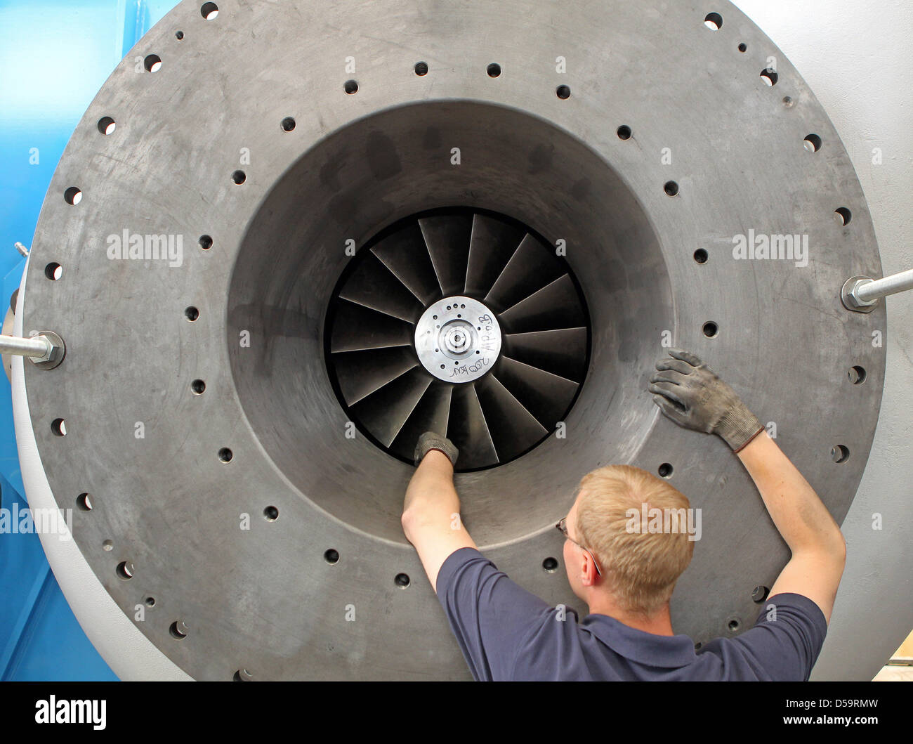 The mechatronic engineer Ronny Stecher works on a compressor-turbine ...
