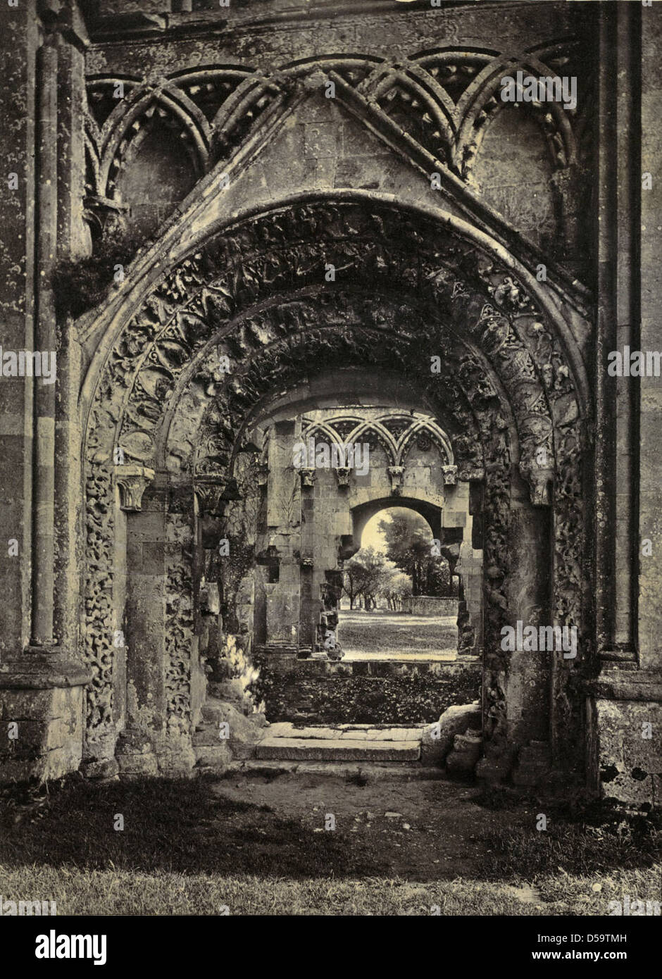 An illustration of the arched portals and archivolts of Glastonbury ...