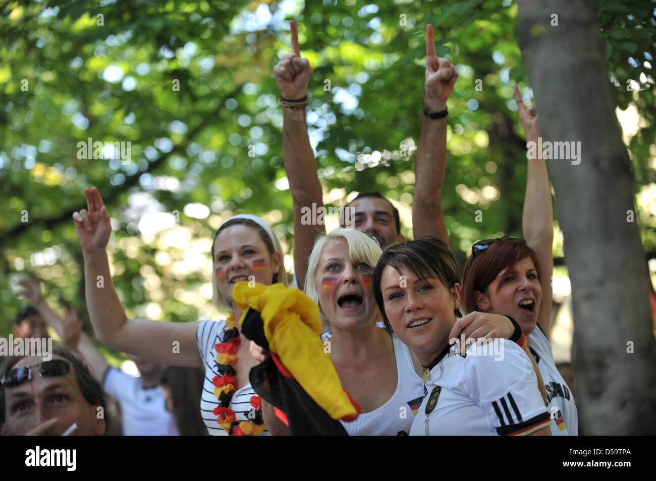 Fans of the German soccer team cheer after the World Cub quarterfinal ...