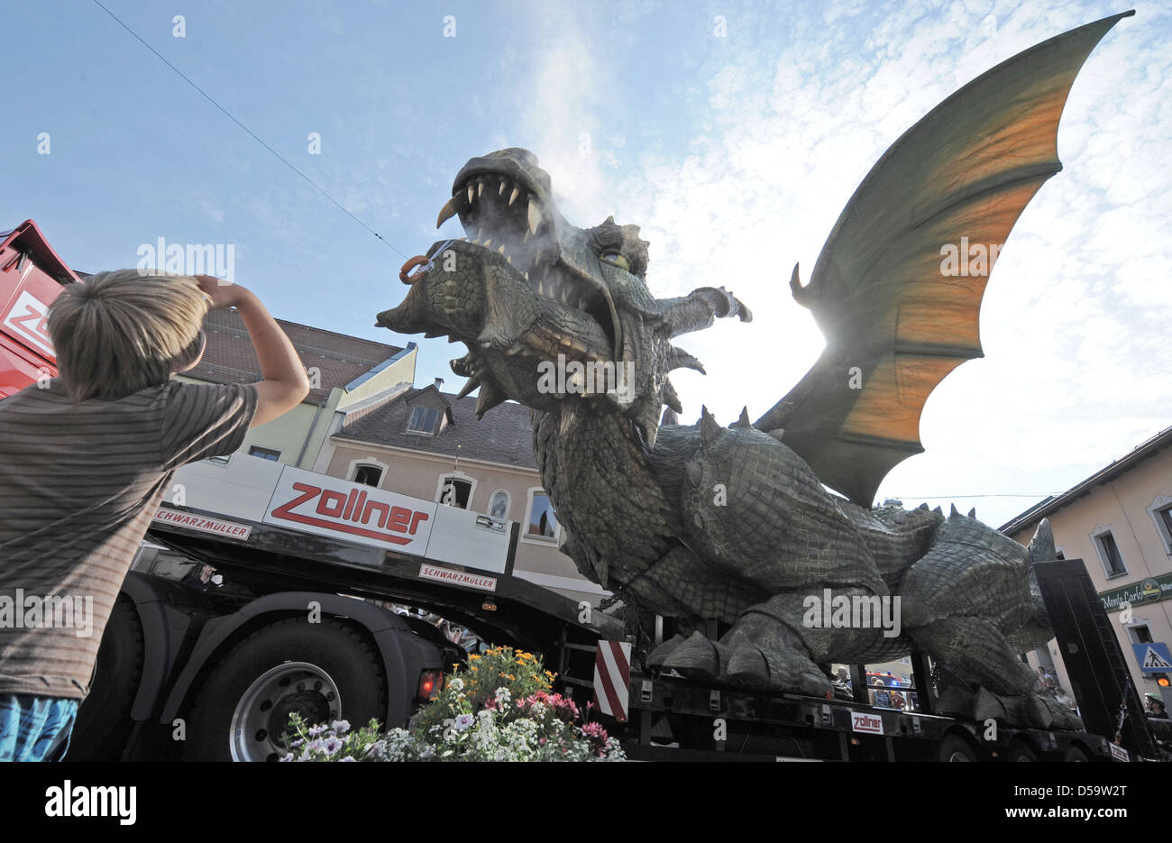 A boy marvels at the new and improved dragon in Furth im Wald, Germany ...