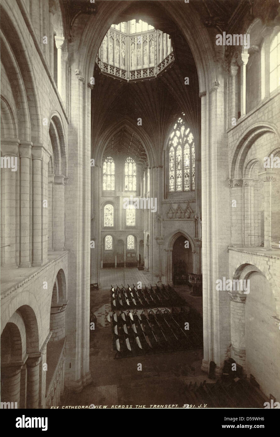 This photograph captures the view across the transept of Ely Cathedral ...