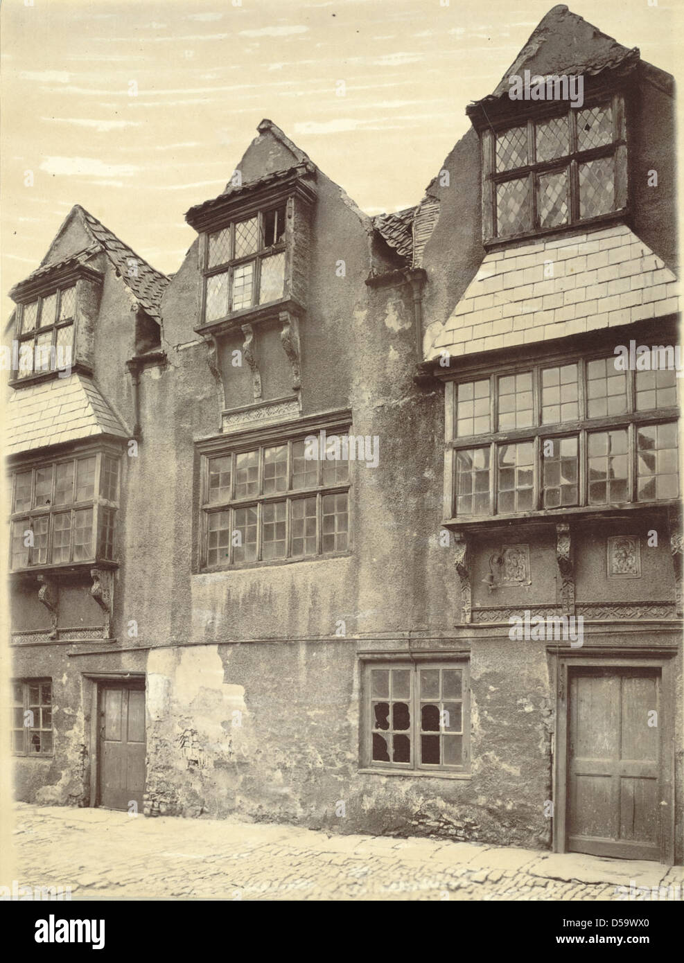 This photograph shows the Old Inn in Wells, England, located on ...