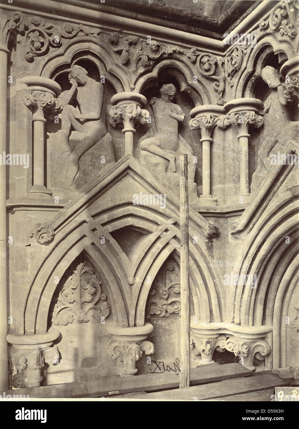 Niche sculptures on the west façade of Wells Cathedral, featuring plant ...