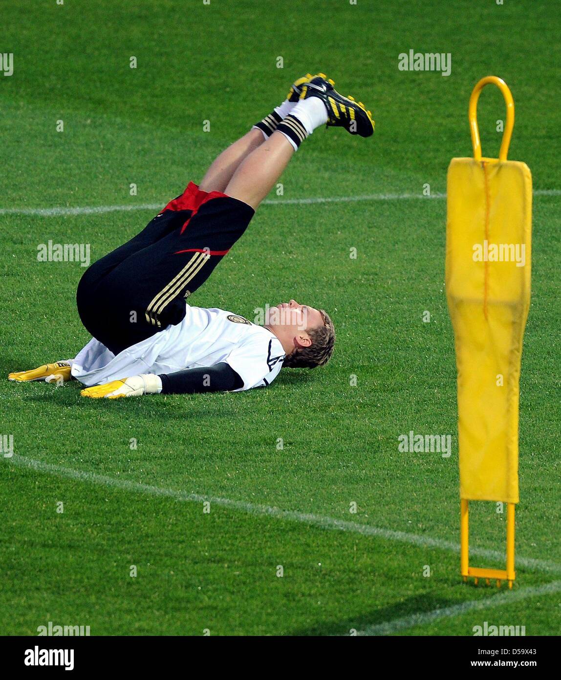 German goalkeeper Manuel Neuer stretches during a training session of ...