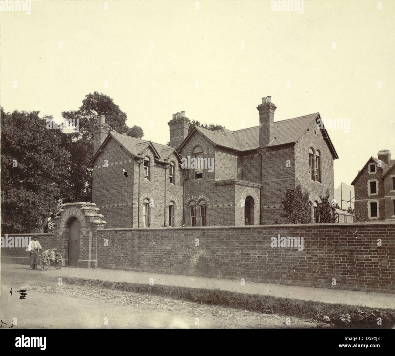 This photograph showcases a traditional 19th-century English house ...