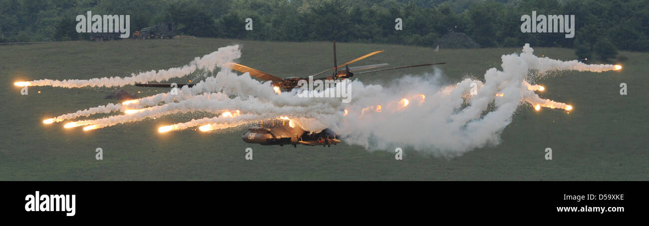 A CH-53 helipcopter fiores so-called Flares during Air Force maneuovre ...