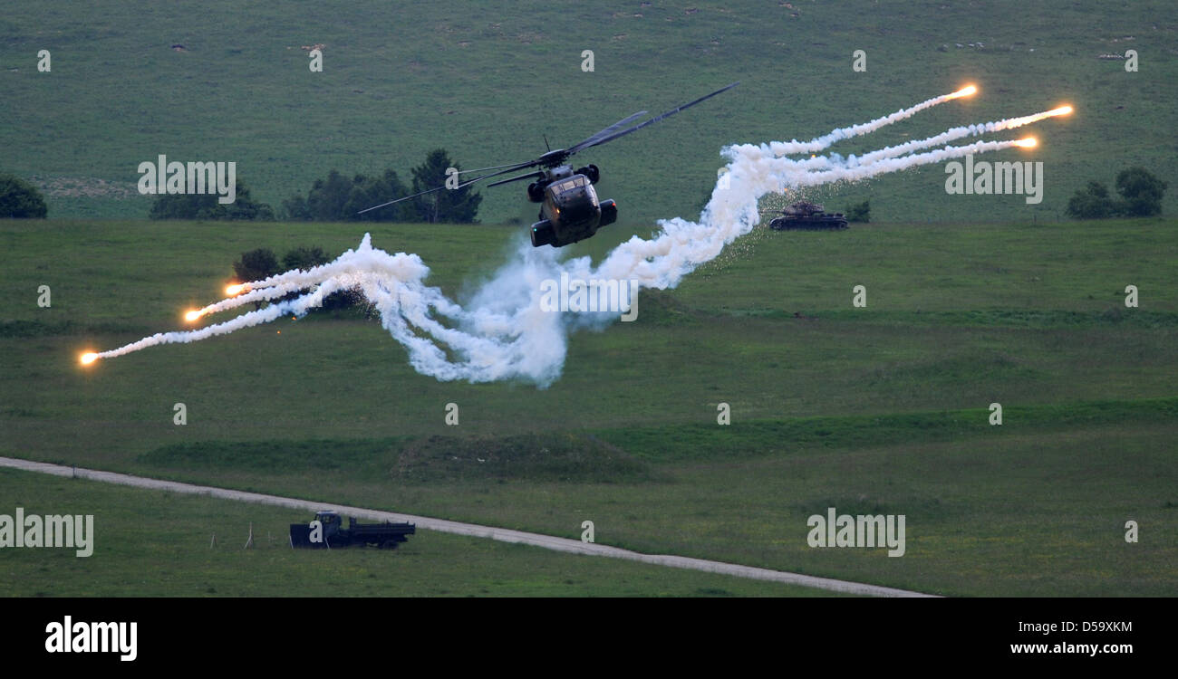 A CH-53 helipcopter fires so-called Flares during Air Force maneuovre ...