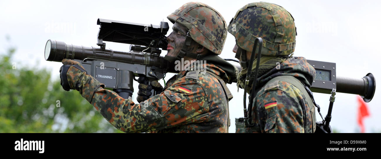 A German Bundeswehr soldier aims with a Stinger surface-to-air missile ...