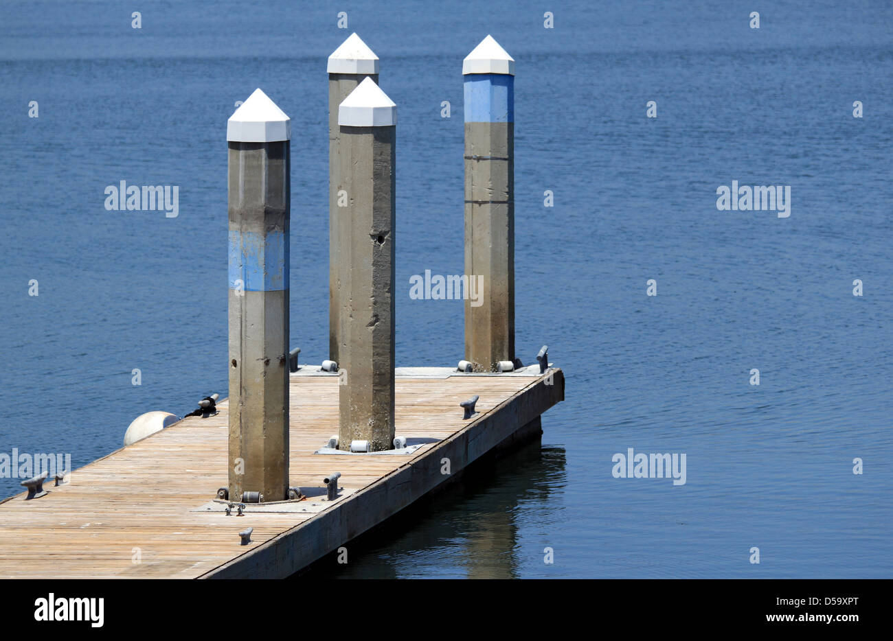 Wooden poles dock on hi-res stock photography and images - Alamy
