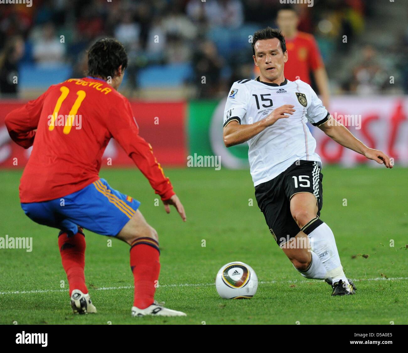 Germany's Piotr Trochowski (R) and Spain's Joan Capdevila vie for the ...