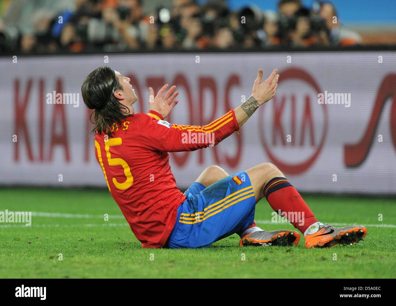 Spain's Sergio Ramos on the ground during the 2010 FIFA World Cup semi ...