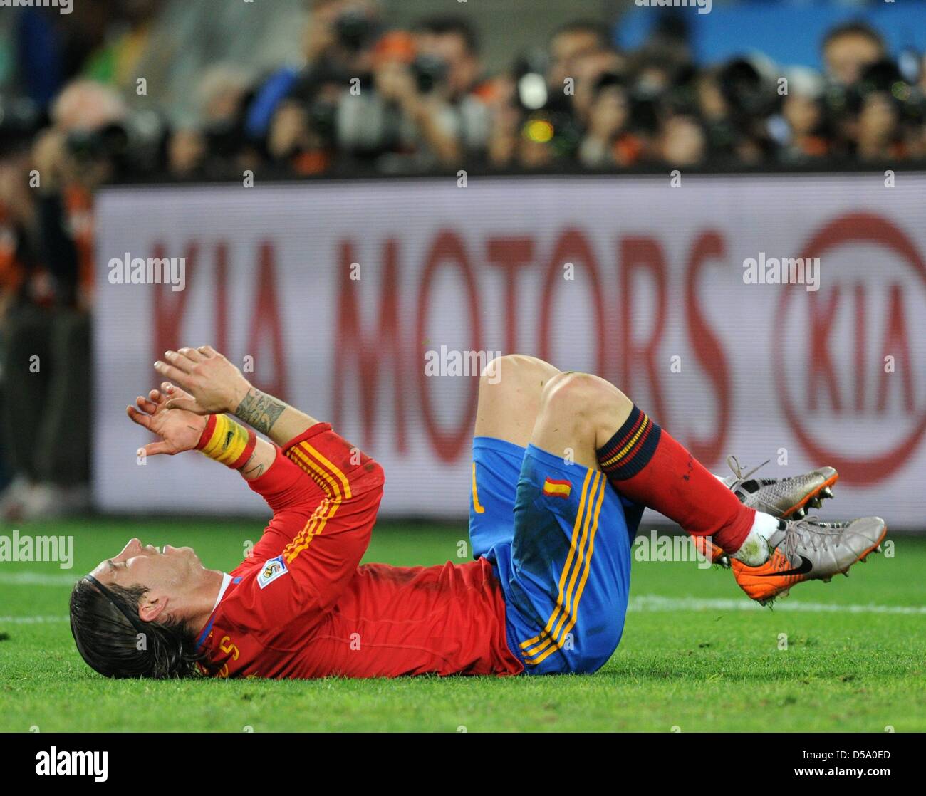 Spain's Sergio Ramos on the ground during the 2010 FIFA World Cup semi ...