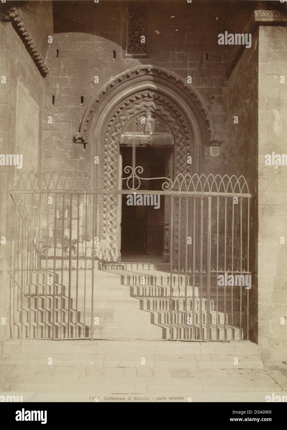 This image shows the side entrance of Bitonto Cathedral in Italy ...