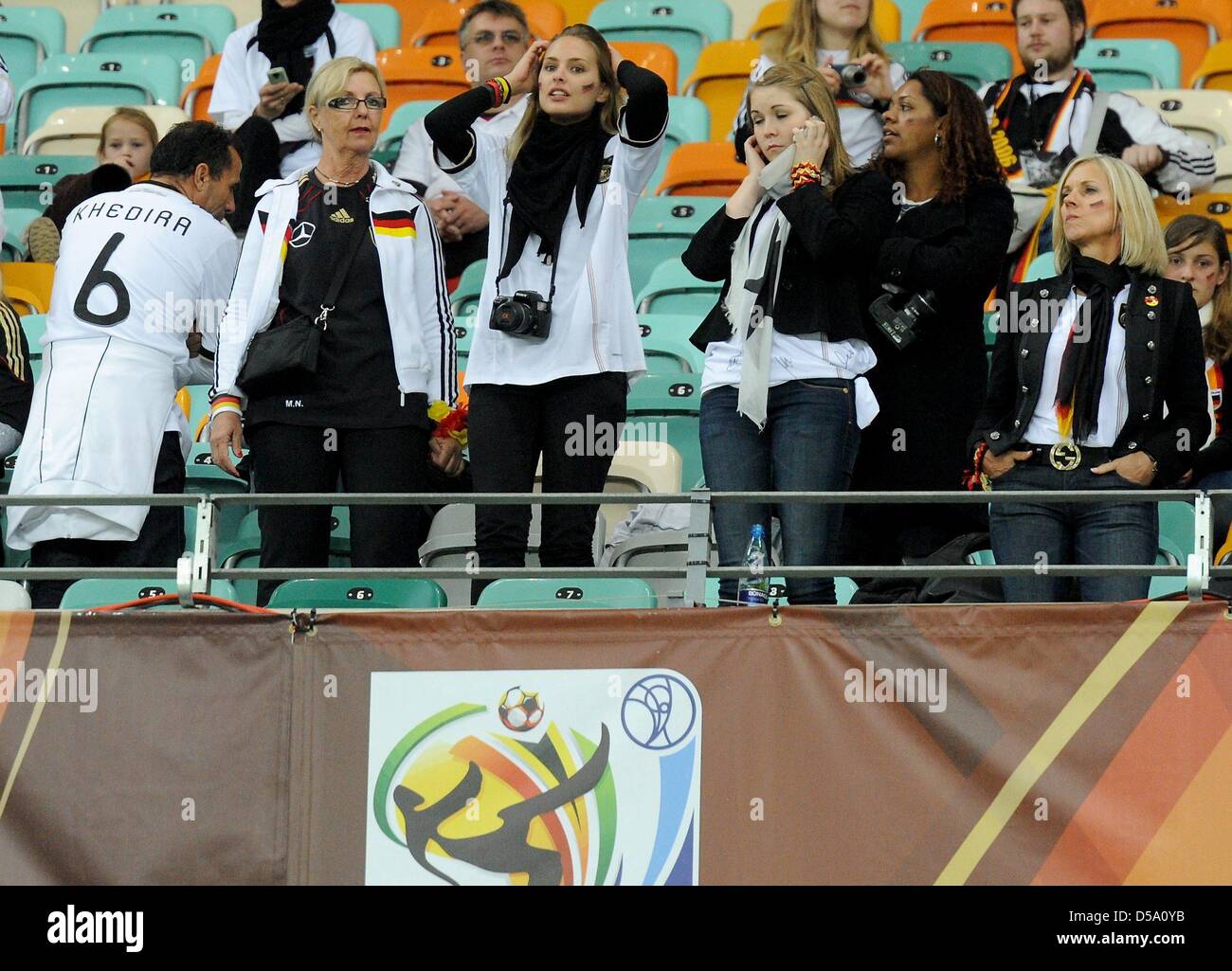 Jacqueline (C), girlfriend of Marcell Jansen and Tamara (2nd R), wife ...