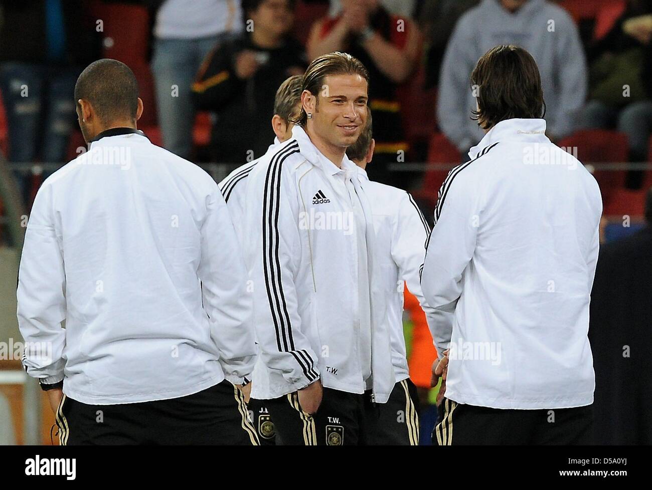 German players Dennis Aogo (L-R), Tim Wiese and Sami Khedira chat on ...