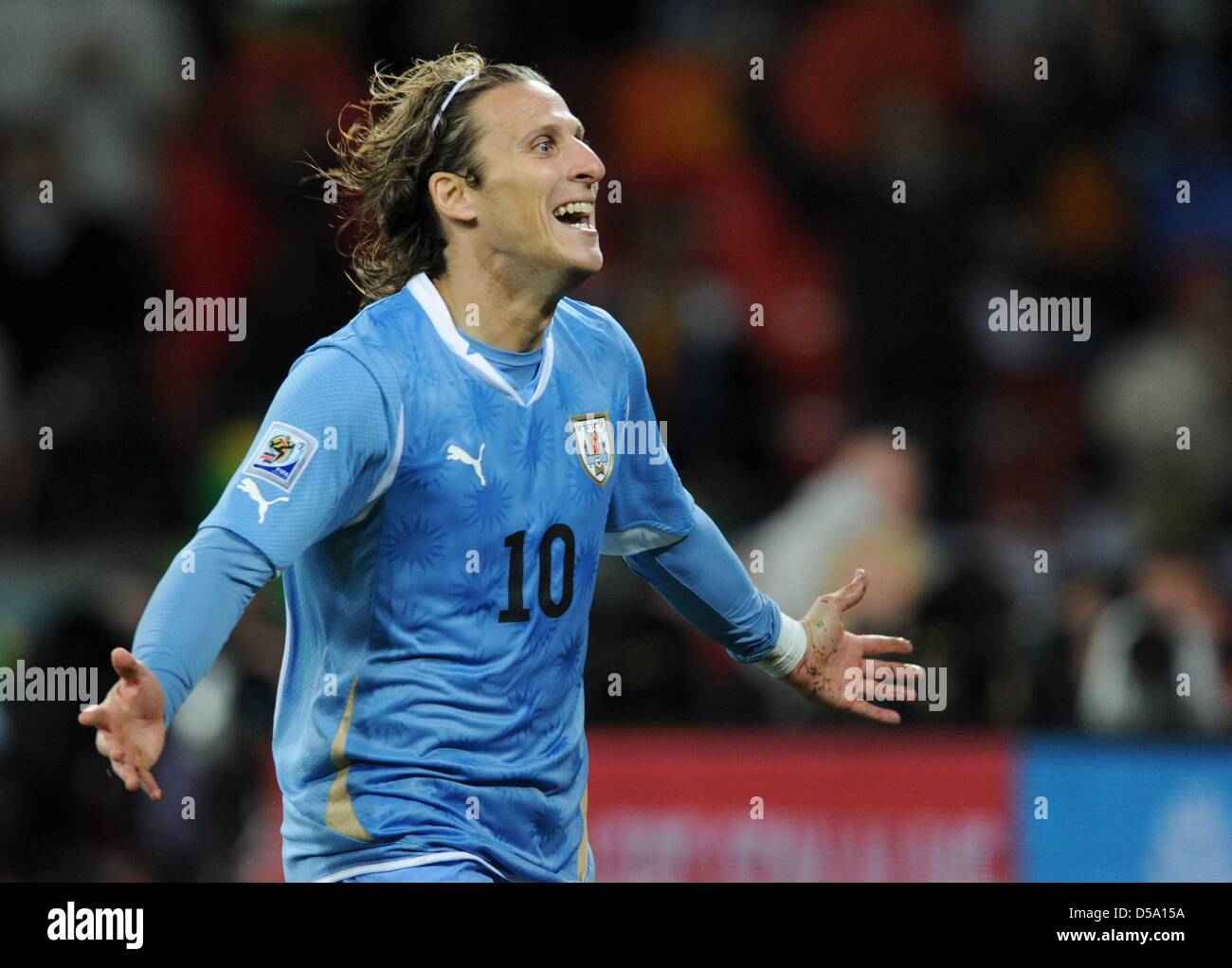 Uruguay's Diego Forlan celebrates scoring the 2-1 during the 2010 FIFA ...