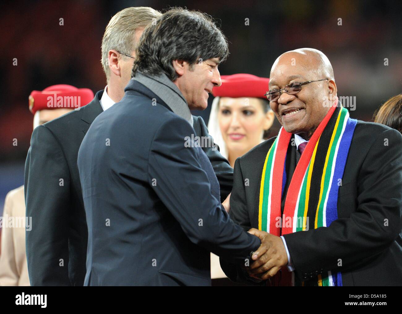 South African President Jacob Zuma (R) congratulates German headcoach ...