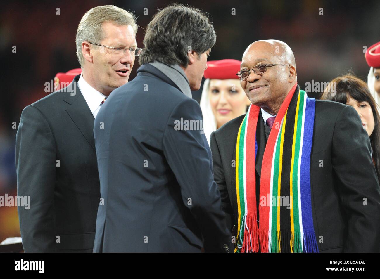 South African President Jacob Zuma (R) congratulates German headcoach ...