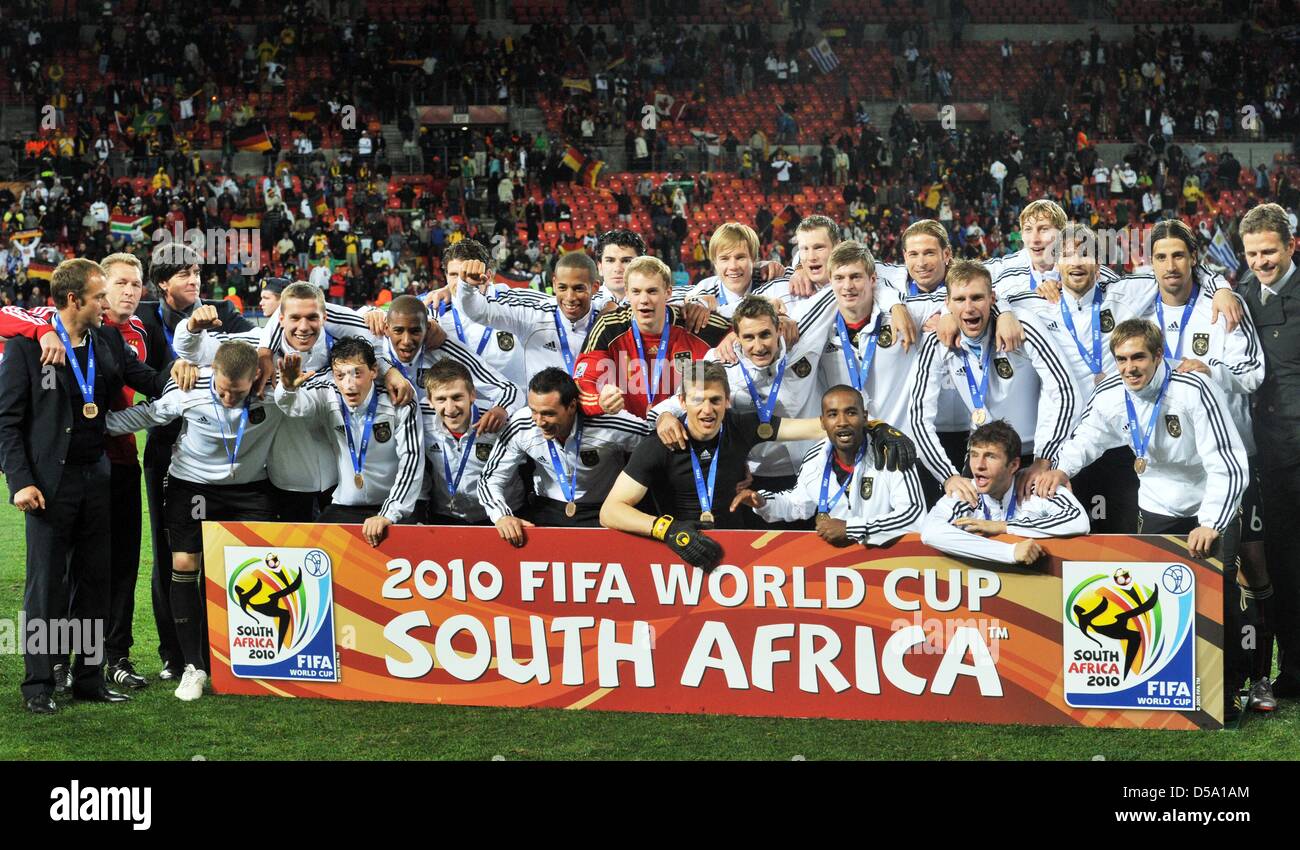 The German team celebrate with the bronze medal after the 2010 FIFA ...
