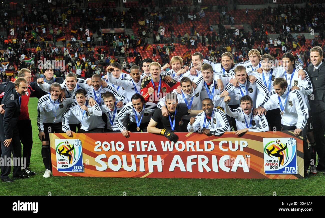 The German team celebrate with the bronze medal after the 2010 FIFA ...