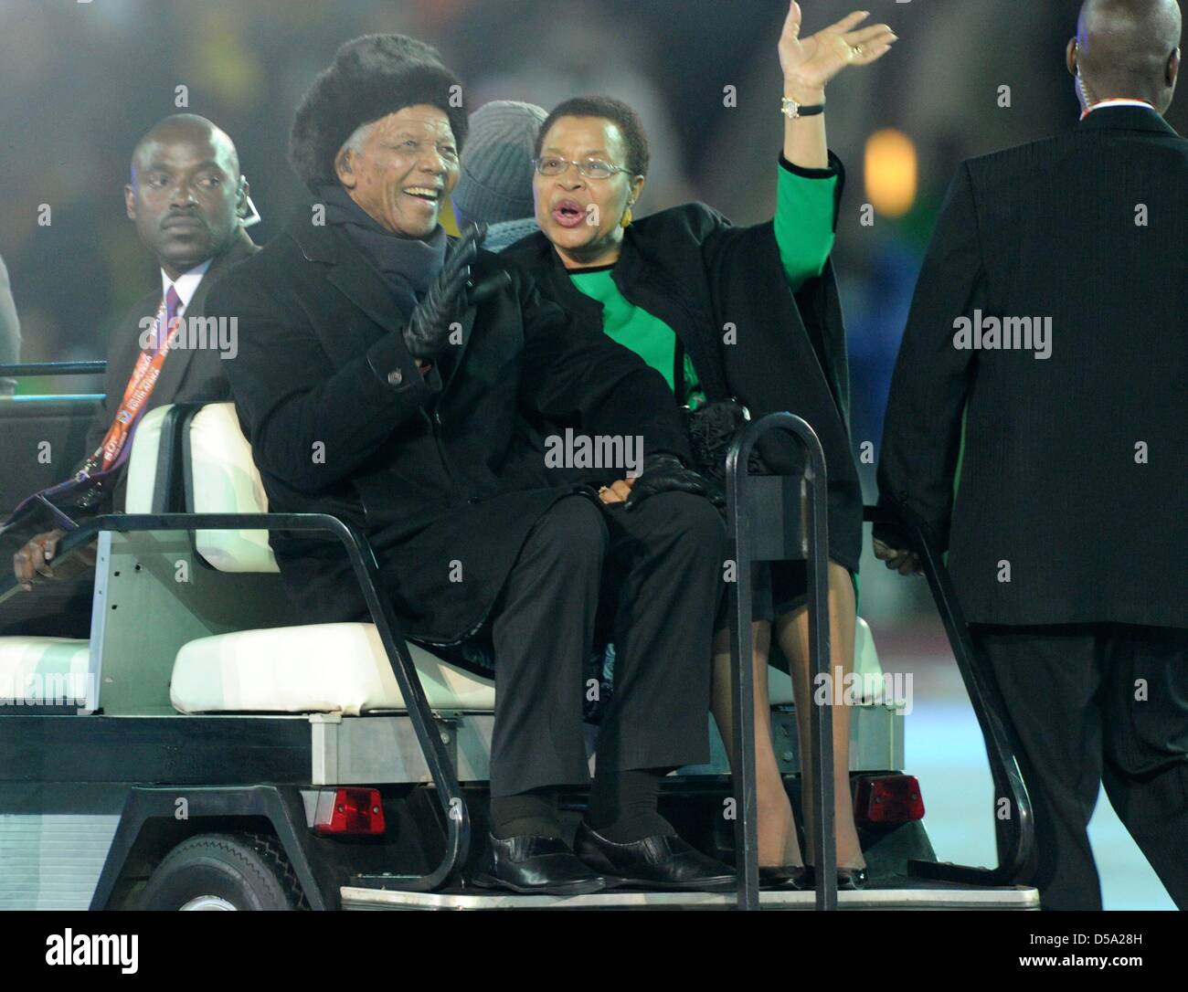 Former South African President Nelson Mandela and his wife Graca Machel ...