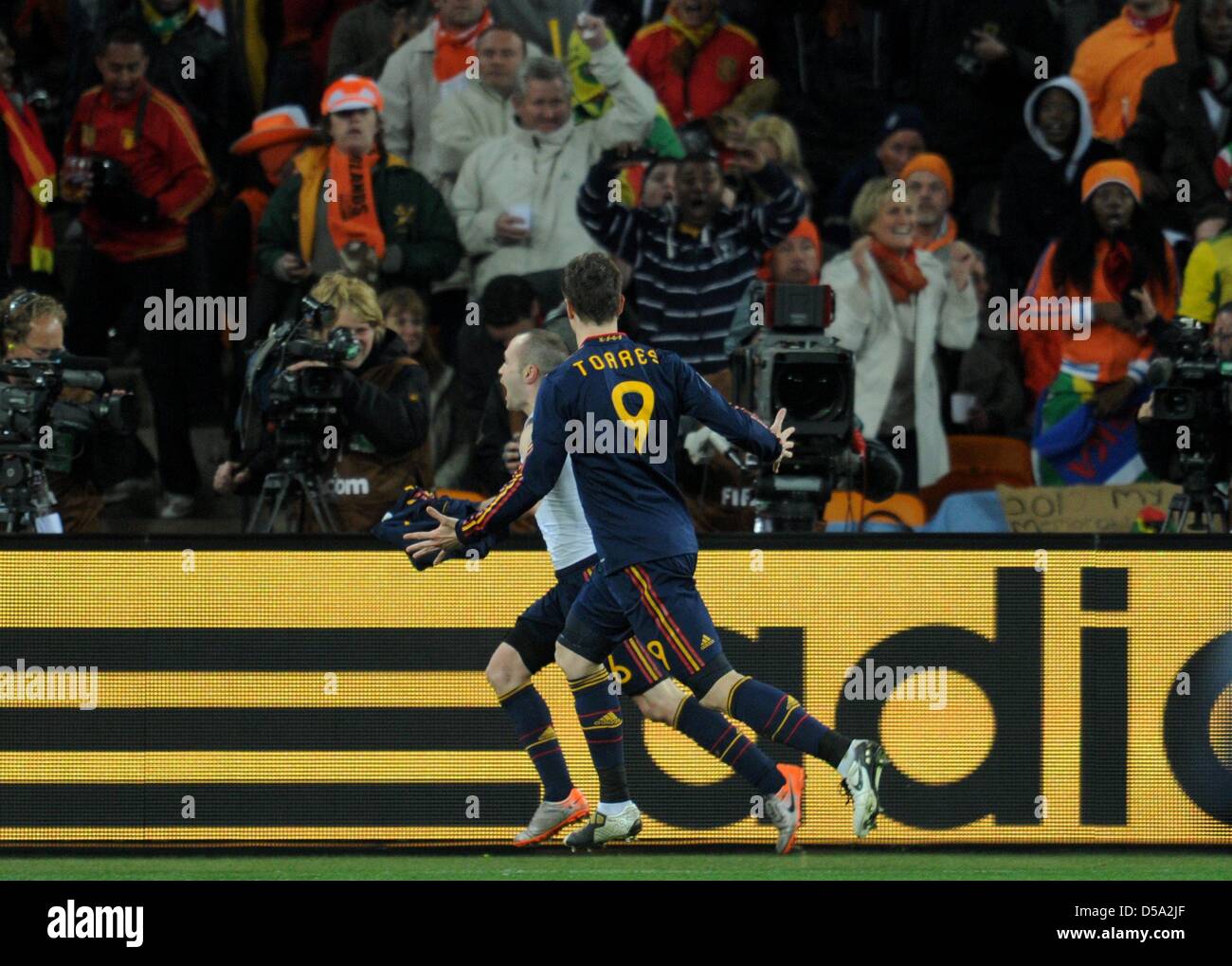 Andres Iniesta (L) of Spain celebrates with Fernando Torres after ...