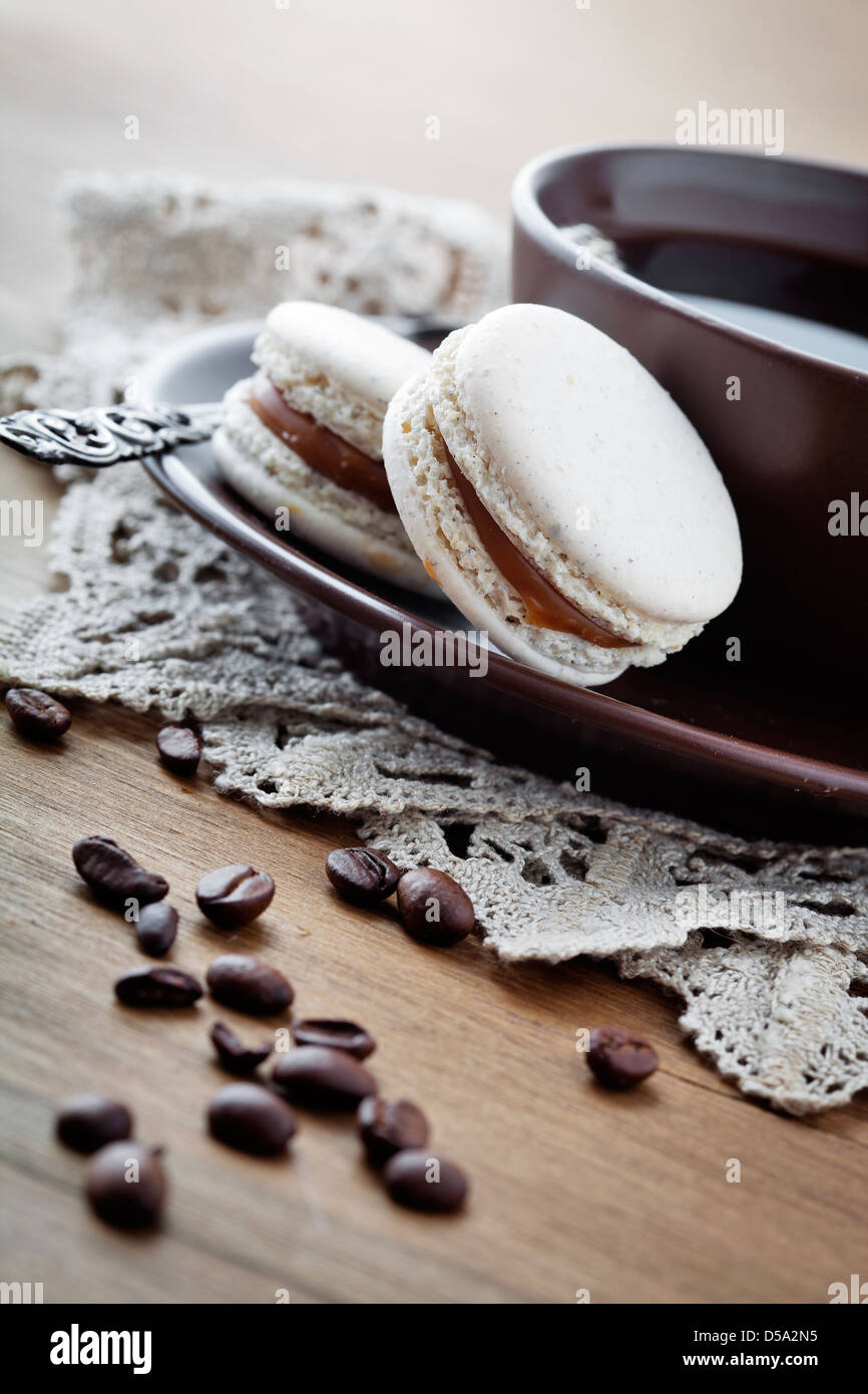 Cup of hot coffee with french macaroon Stock Photo - Alamy