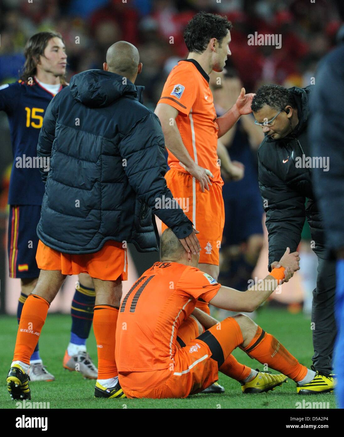 Dutch Arjen Robben sits on the pitch after the 2010 FIFA World Cup ...