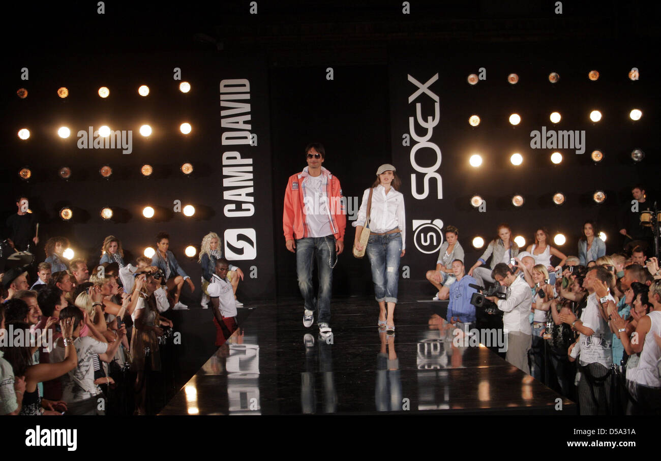 The Swedish model Marcus Schenkenberg (L) walks for the label 'Camp ...