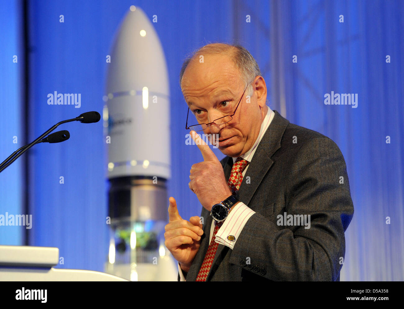 Chairman of Astrium GmbH, Francois Auque, speaks at a ceremony to ...