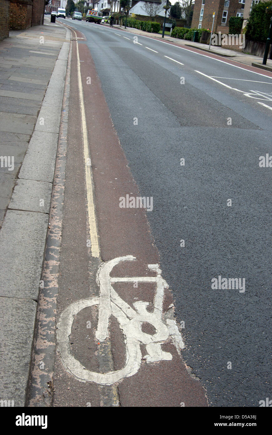 cycle lane bicycle image partially obscured by a new road covering ...