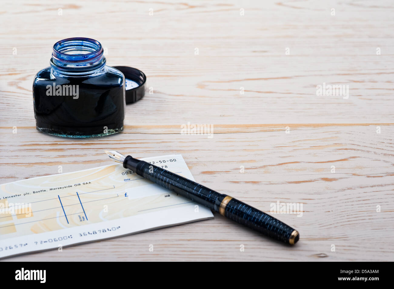 Bank cheque book hi-res stock photography and images - Alamy