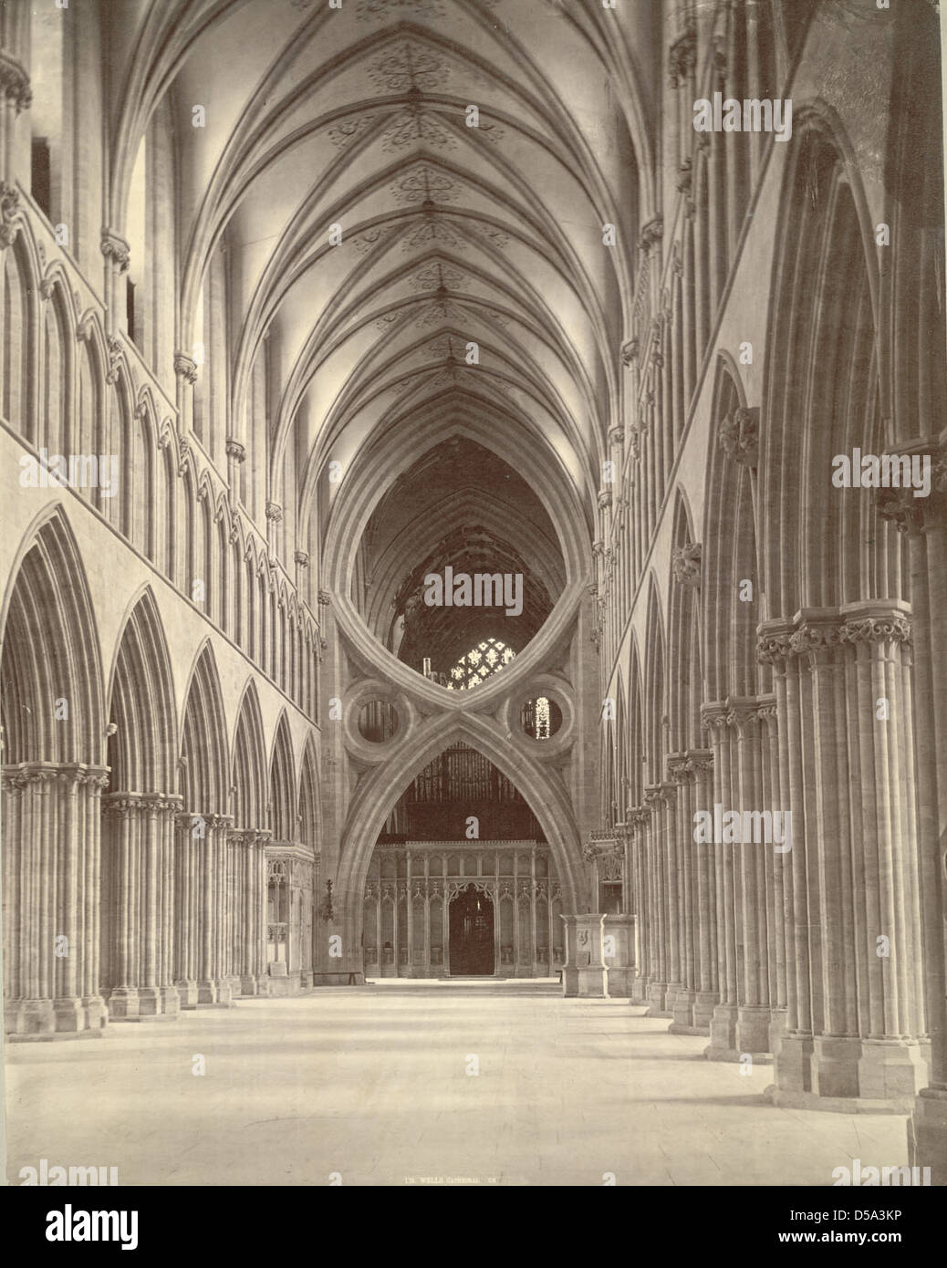 This photograph highlights the scissor arches in Wells Cathedral ...