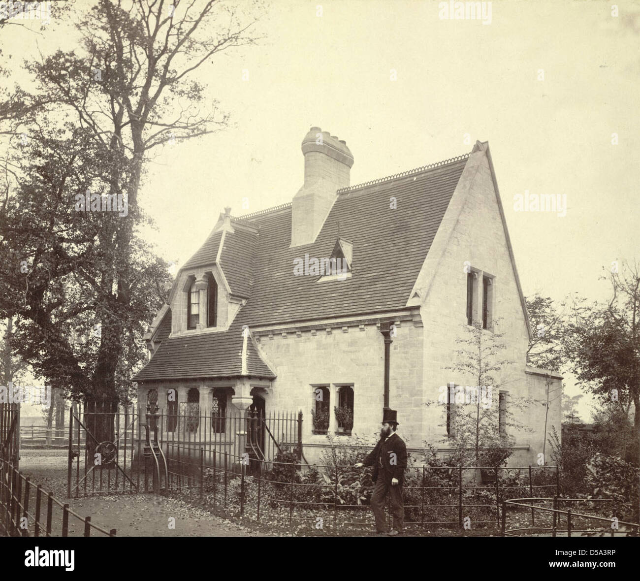 Nineteenth-century house in England featuring gables, gates, and ...
