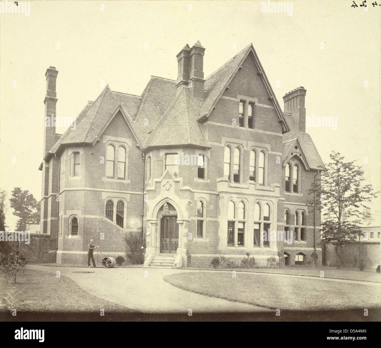 A photograph of a 19th-century house in England, featuring distinctive ...