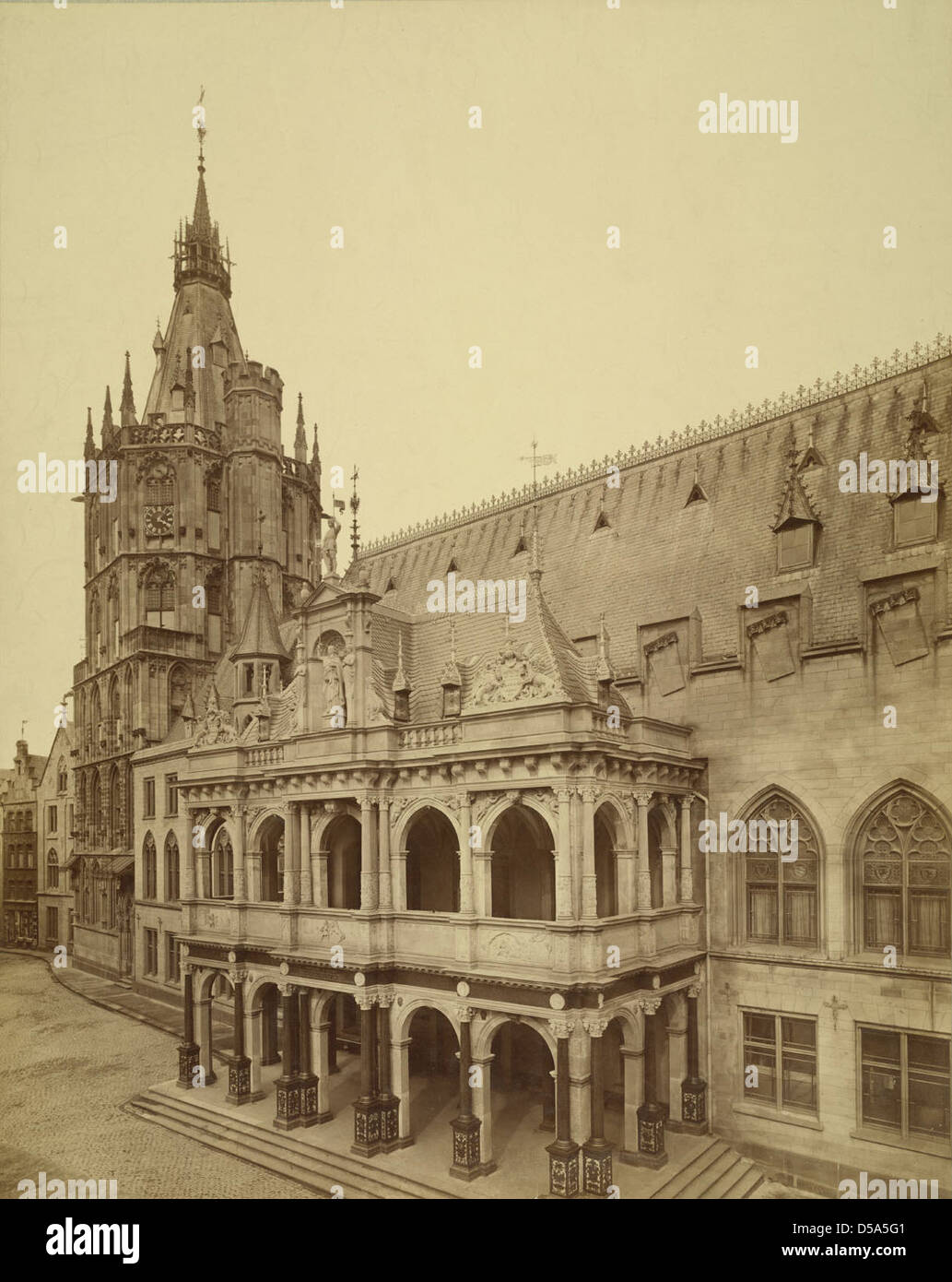 This view of the Cologne Rathaus (City Hall) captures its Gothic ...