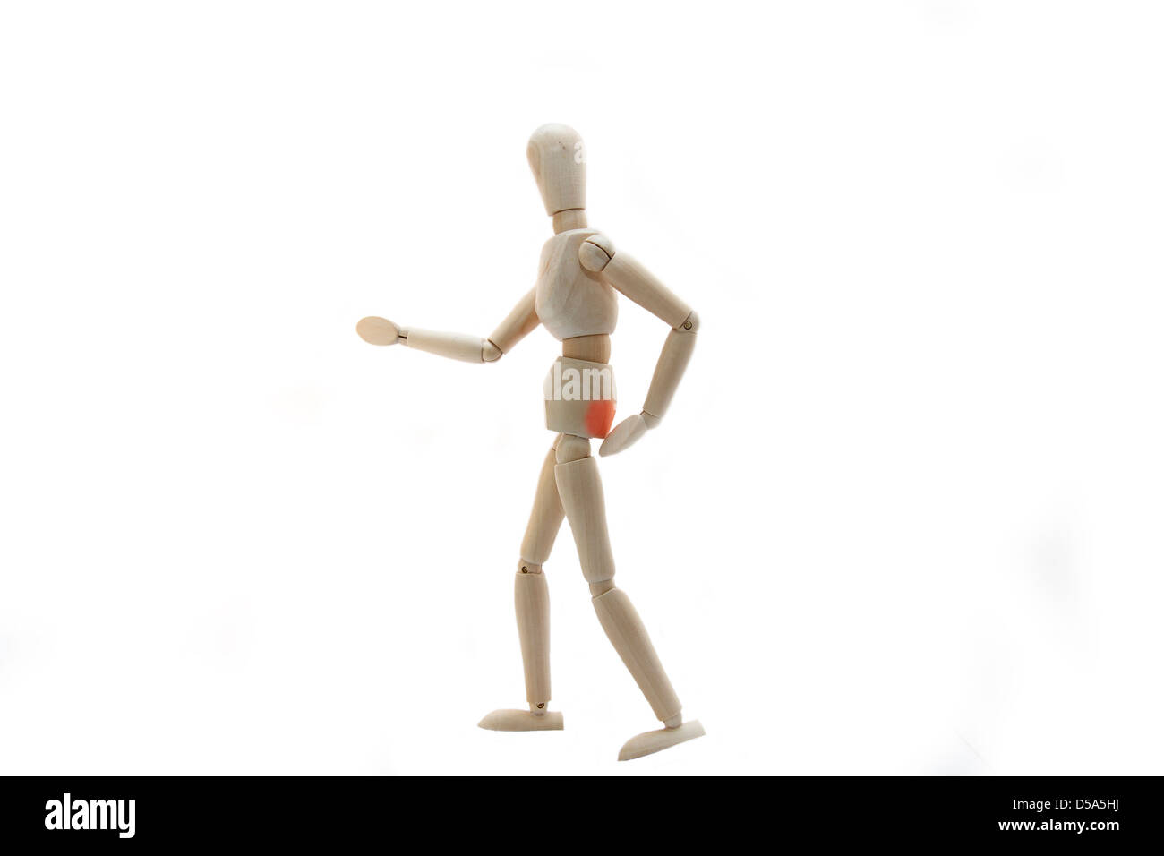 A Wooden Manikin Doll Holding Back With Pain Stock Photo - Alamy