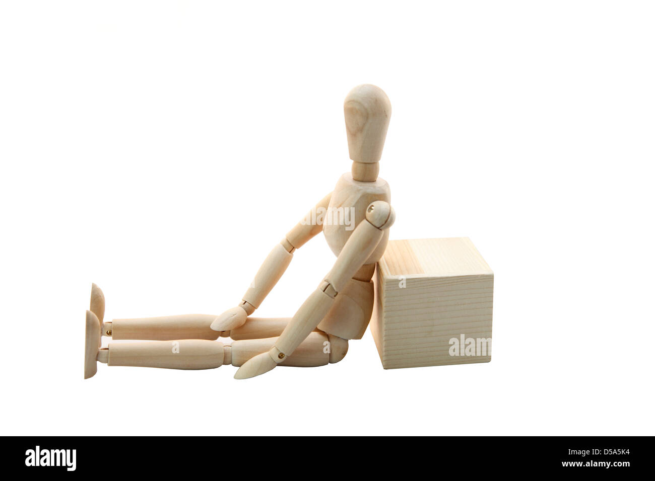 A Wooden Manikin Doll Sitting By A Wooden Box Stock Photo - Alamy