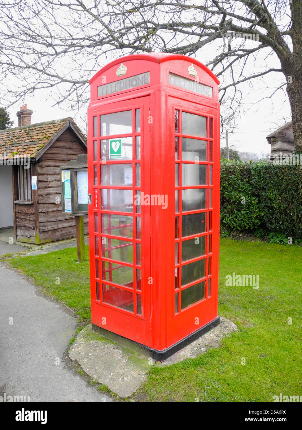 Defibrillator in a village phone box, The old phone box on the green of ...